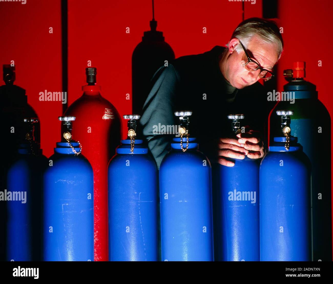 Blue-painted metal cylinders containing compressed carbon dioxide gas ...