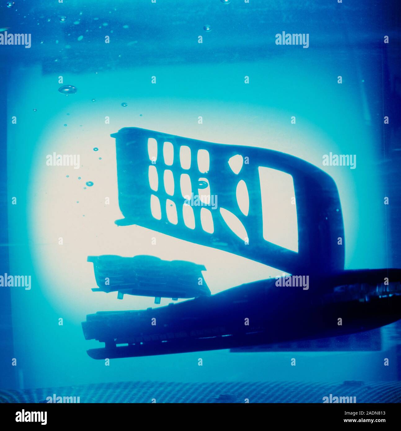 Self-disassembling mobile phone. Mobile telephone in hot water after ...