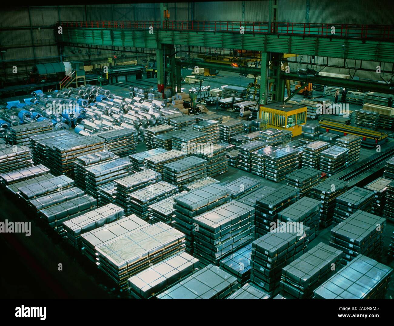 Steel store. Refined sheet steel stored in a warehouse awaiting ...