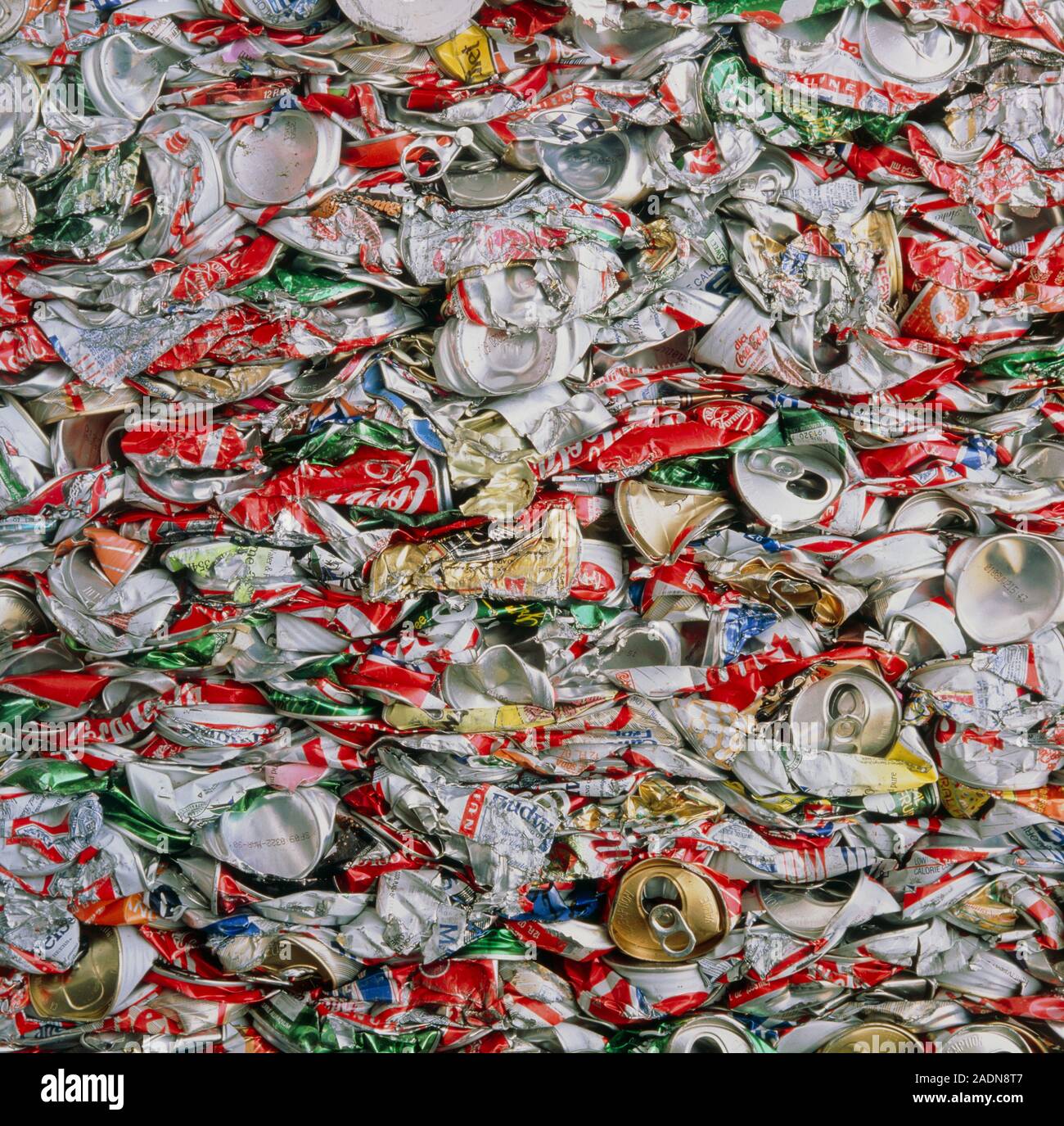 Recycling of drinks cans. Close-up of a bale of compressed drinks cans ...