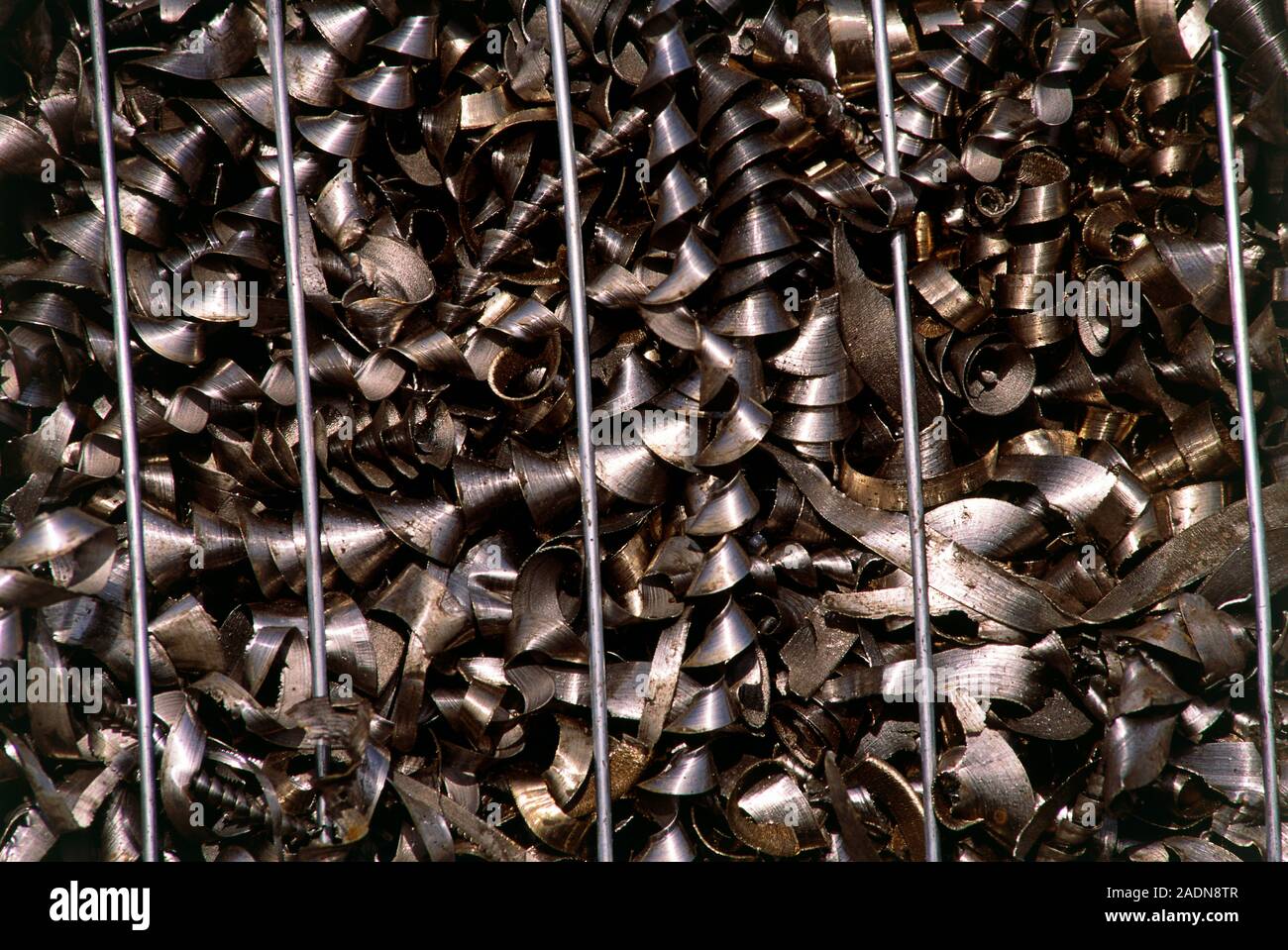 Steel recycling. Close-up view of a bale of steel turnings. The ...