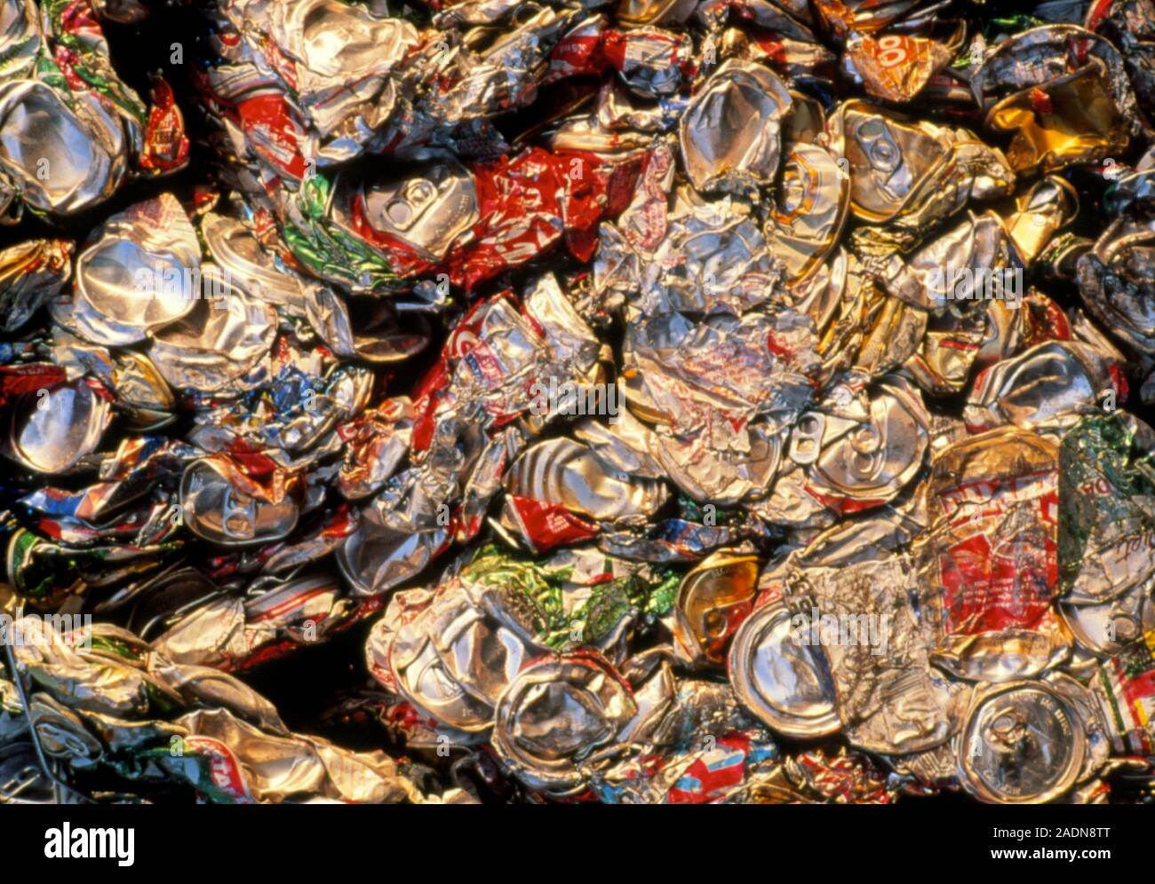Aluminium recycling. Close-up view of compacted aluminium drinks cans ...