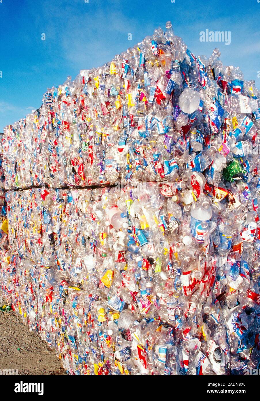 Plastic recycling. Blocks of crushed plastic bottles for recycling ...