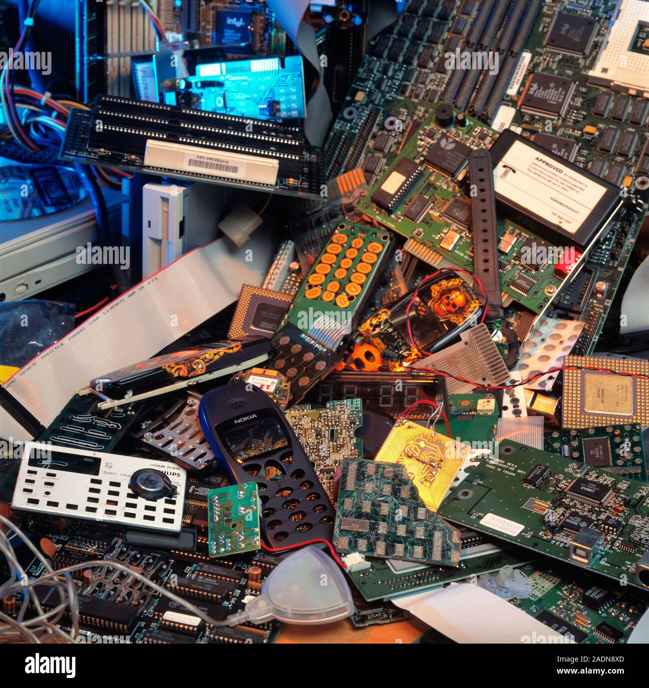 Electronic scrap. Pile of discarded computer components and other ...