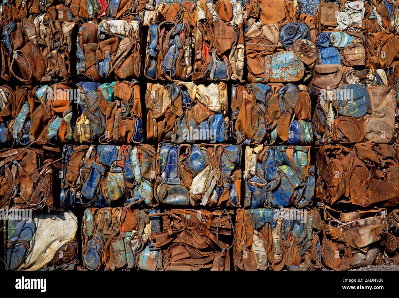 Scrap metal bales. Compressed bales of scrap metal stacked on top of ...