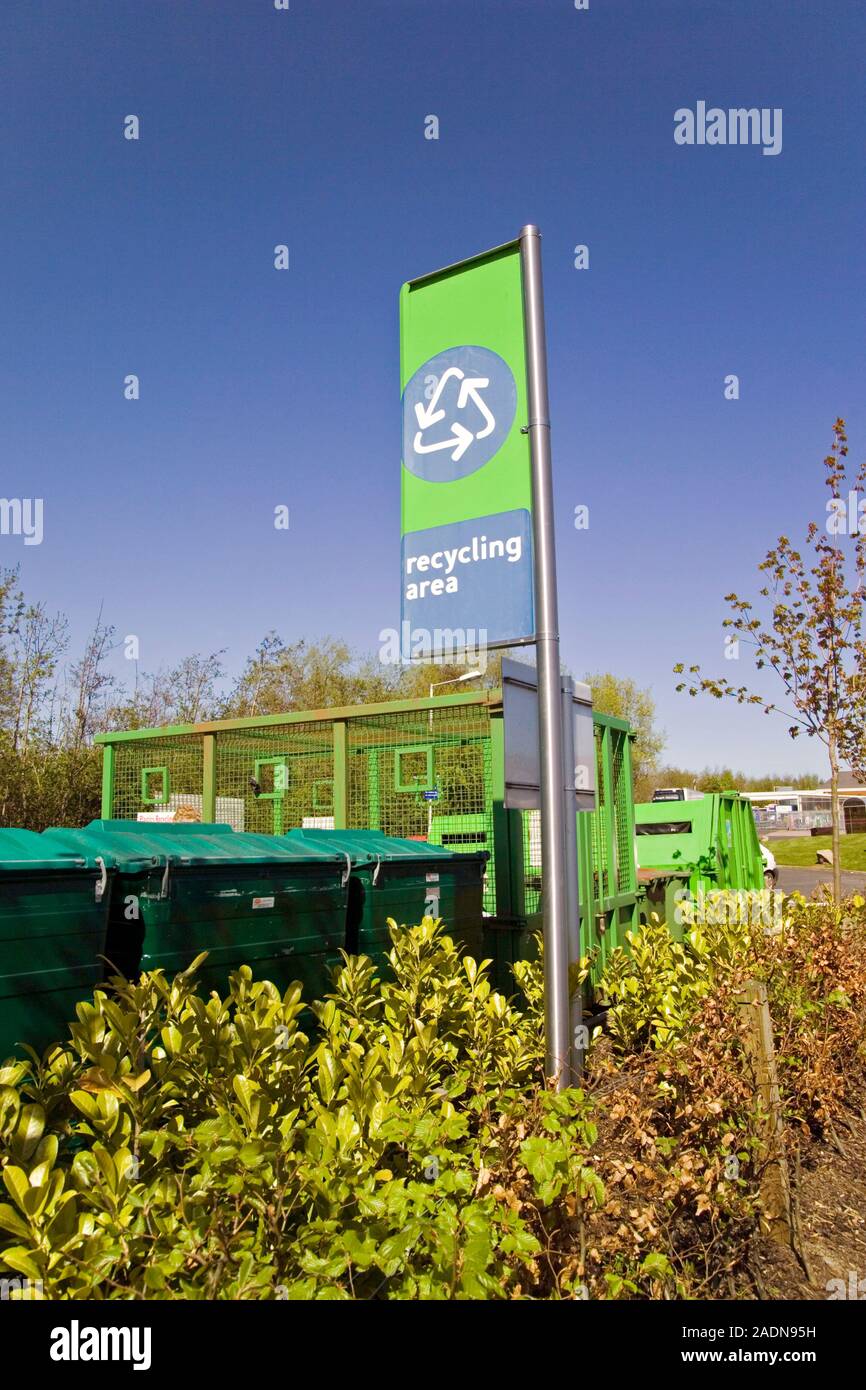 Recycling collection point. Recycling symbol on a sign at a recycling ...