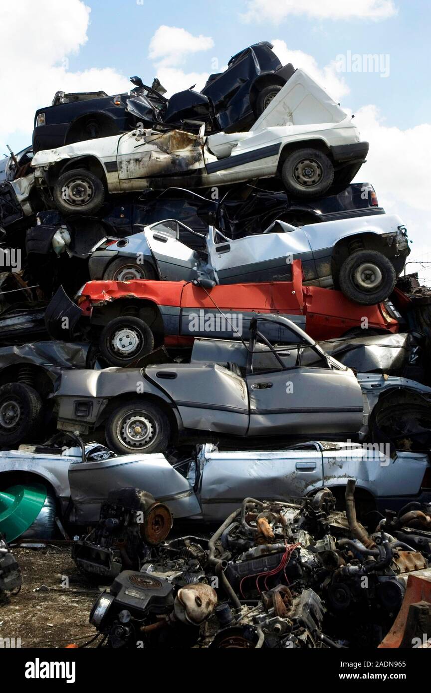 Recycling scrapped cars. Pile of scrapped cars awaiting processing at a ...