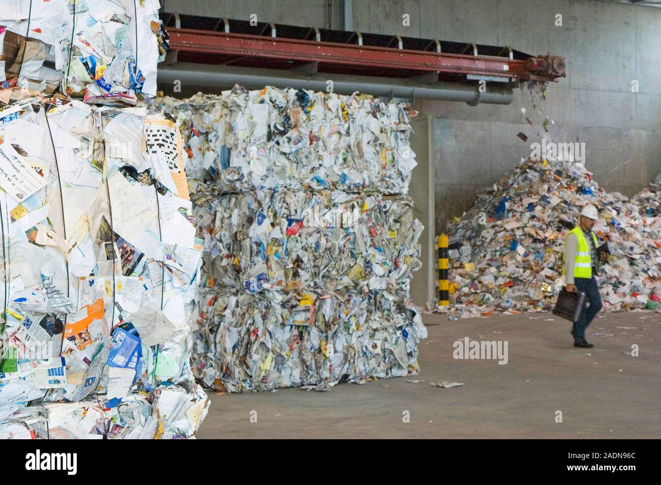 Recycling domestic waste. Paper bales formed from domestic and office ...