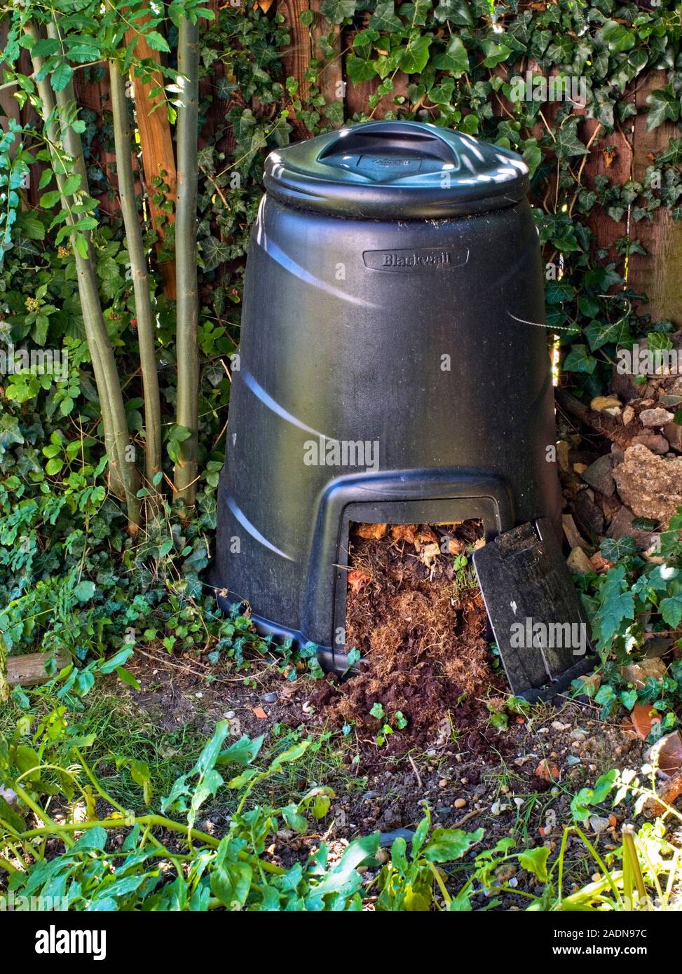 Compost bin. Domestic waste decomposes over time to be recycled as ...