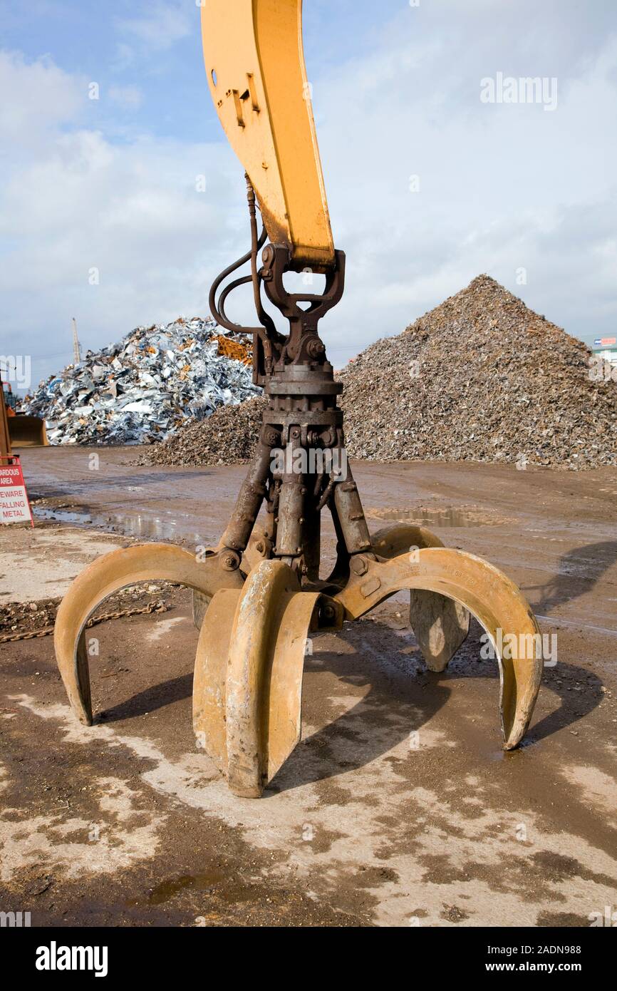 Crane grabber claw. This device is electromagnetic, which enables it to ...