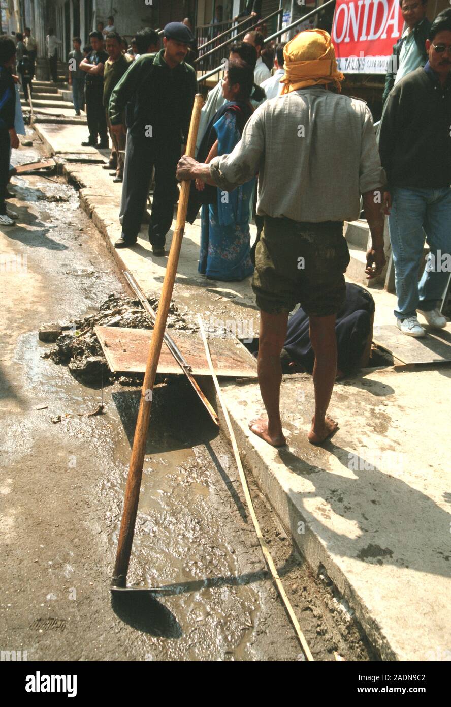 Sewer cleaning in a city street in Sikkim State, India Stock Photo - Alamy