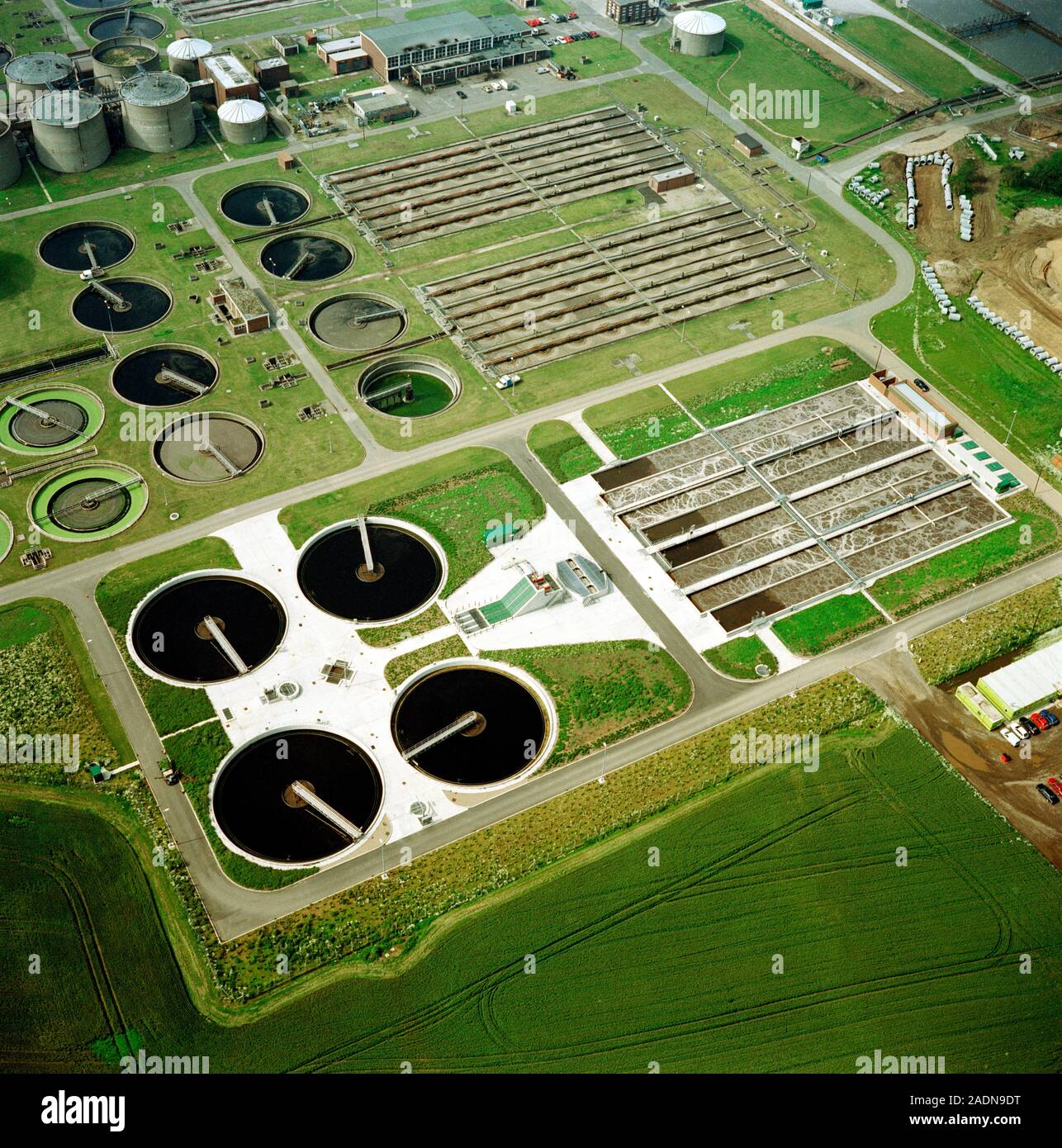 Sewage works, aerial view. Sewage goes through several stages of ...