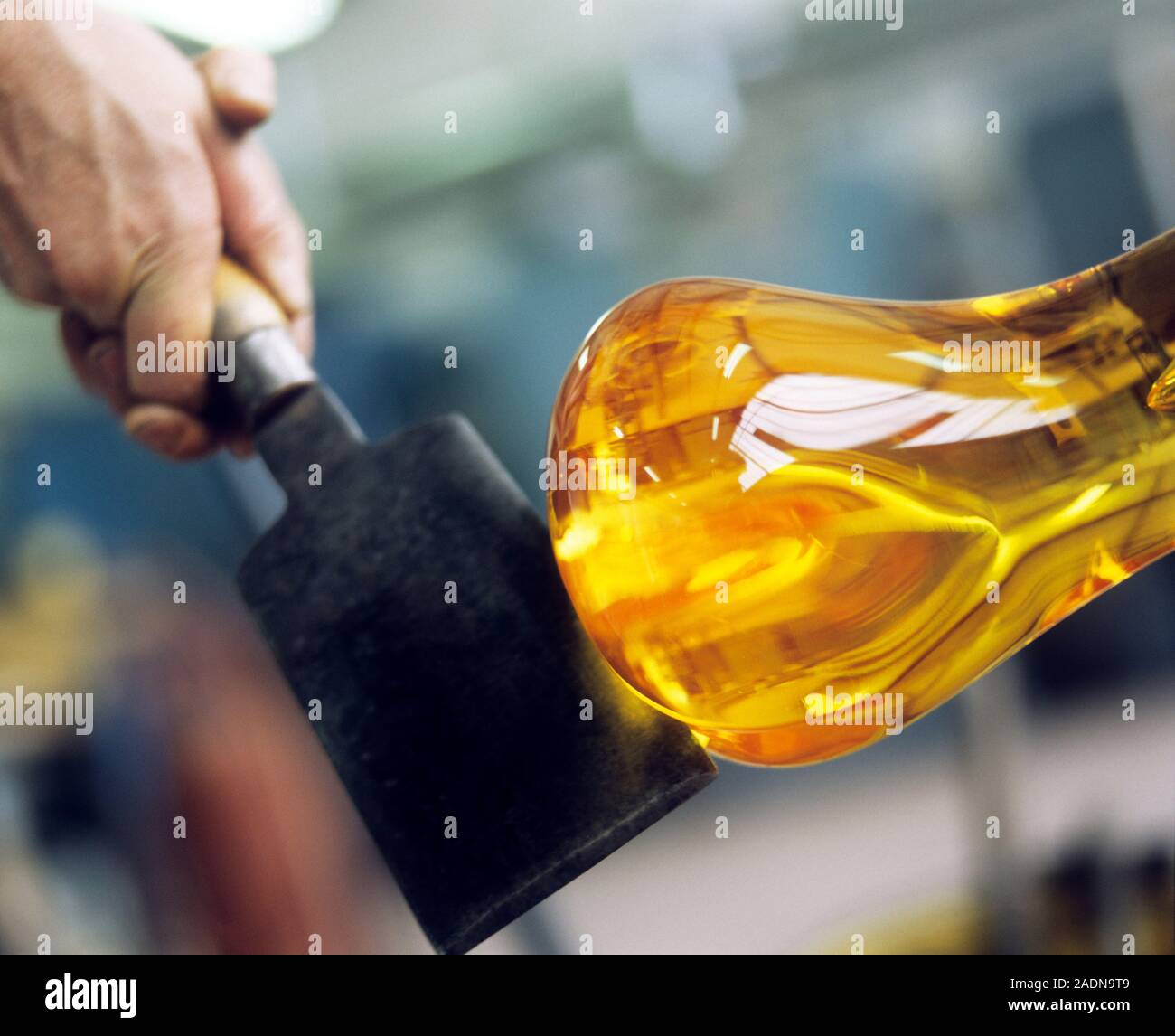 Glass blower shaping a parison (molten glass Stock Photo - Alamy