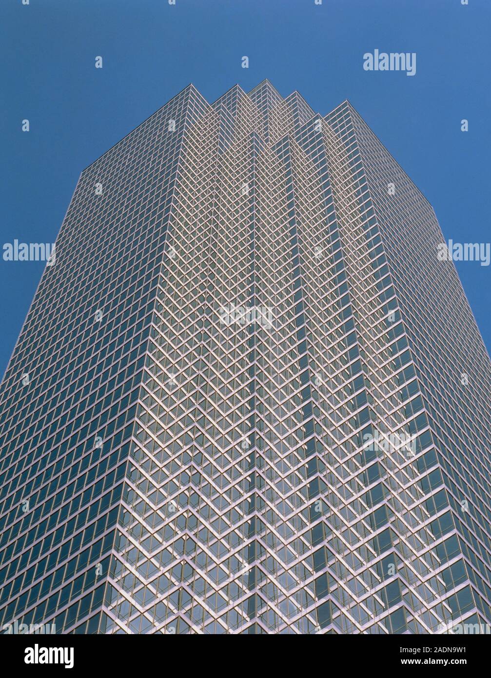 Contemporary architecture. View of a large, high- rise office building ...
