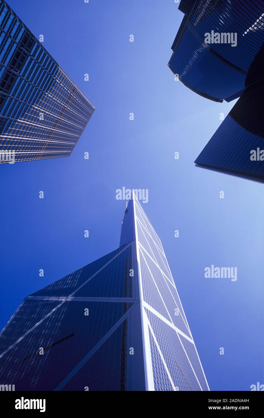 Skyscrapers, Hong Kong, China. View looking up at three skyscrapers ...