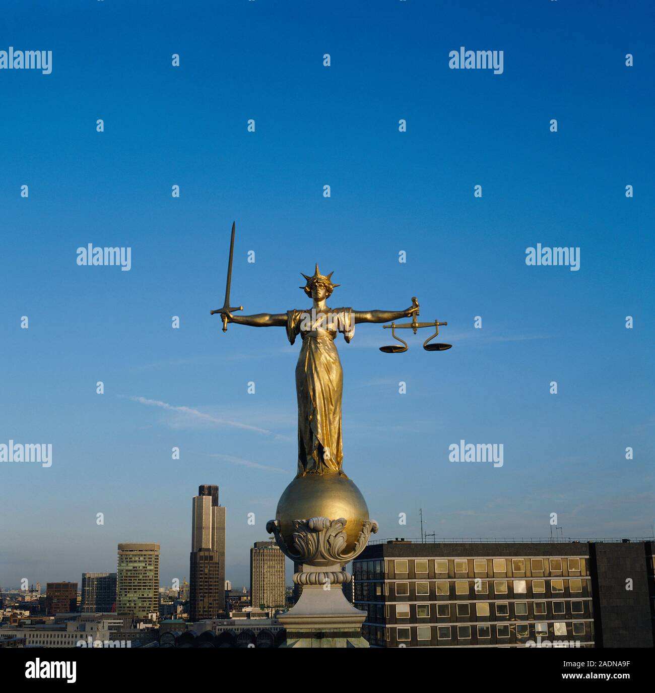 Statue of Justice. This bronze statue of Justice stands on top of the ...
