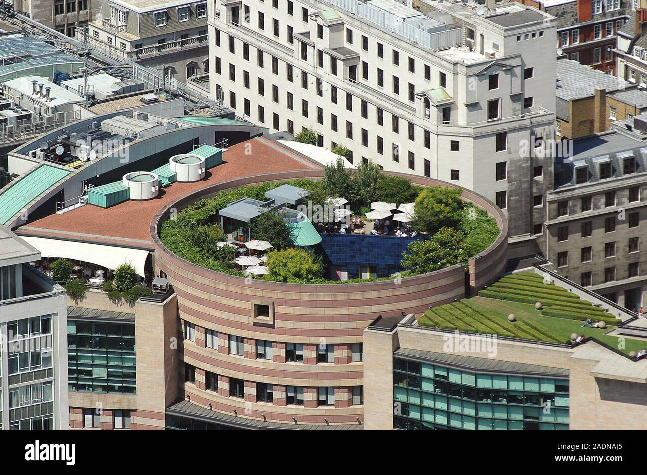 Roof garden. Aerial photograph of people dining in a restaurant on top ...