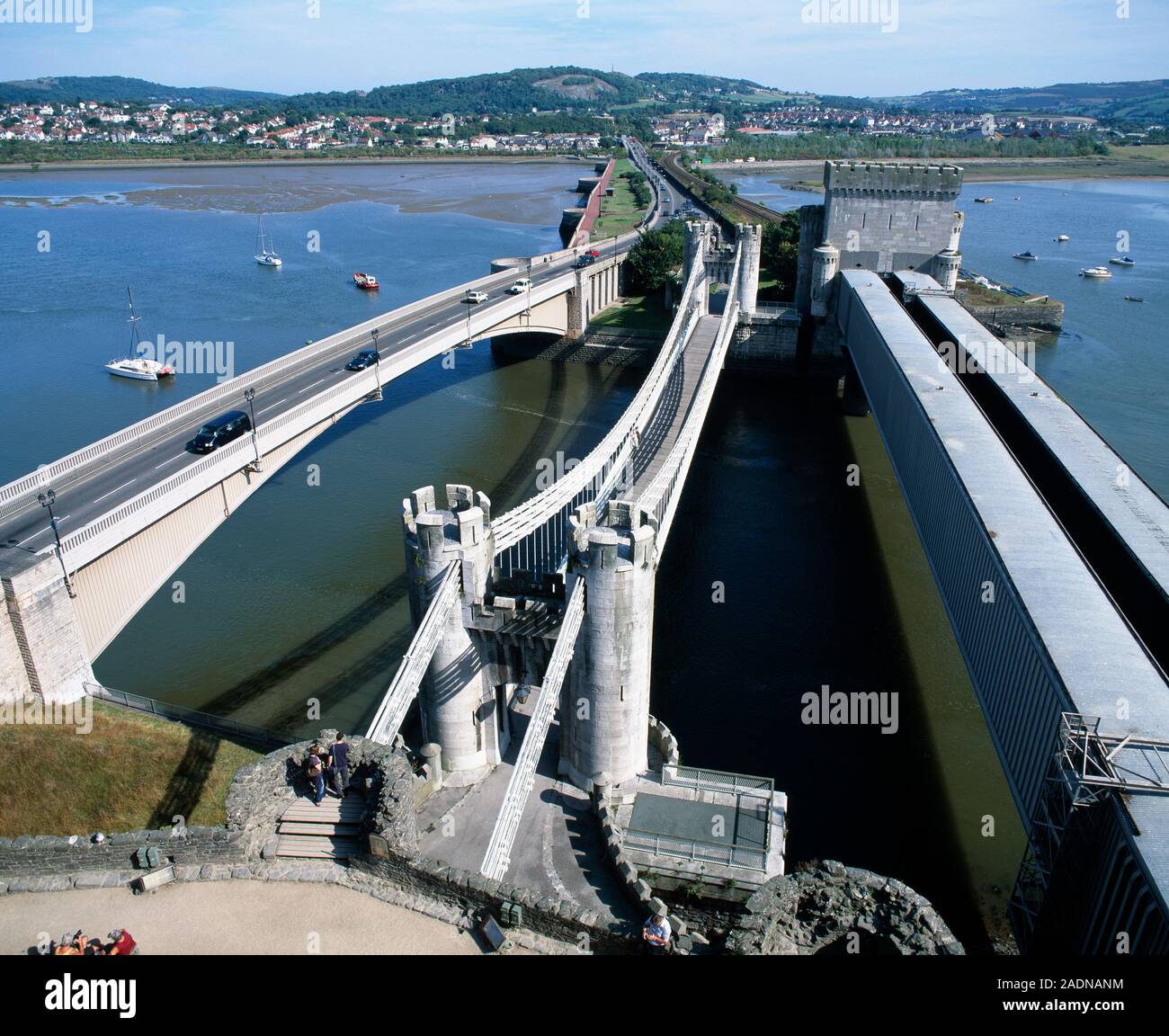 Conwy bridges over the Conwy River, Wales. The suspension bridge (down ...