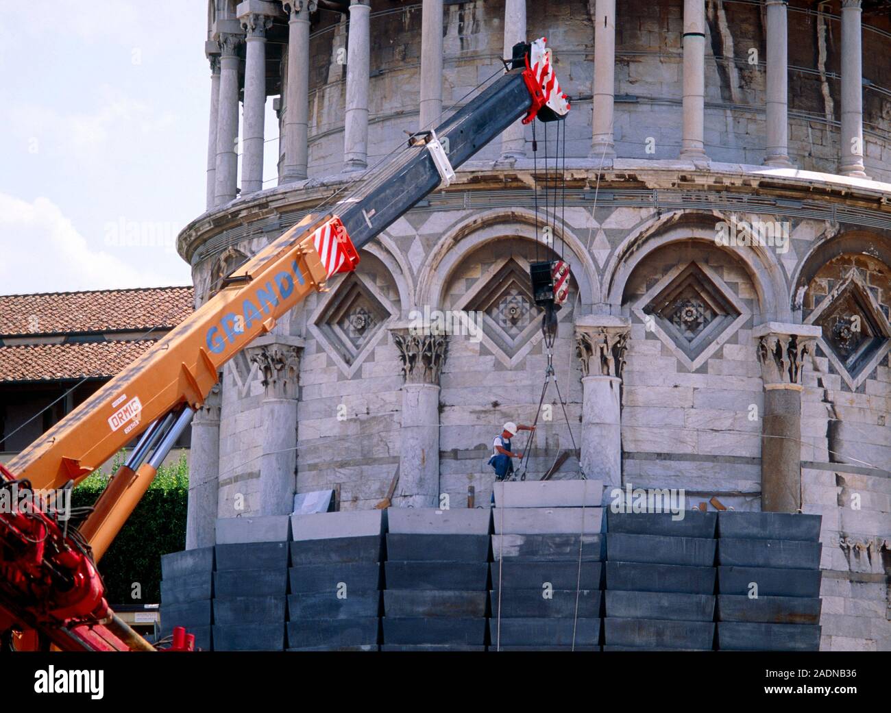Leaning Tower of Pisa preservation. Crane being used to attach lead ...