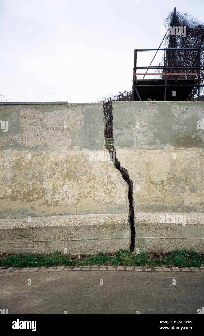 Crack in a wall caused by subsidence. Subsidence is the downwards ...