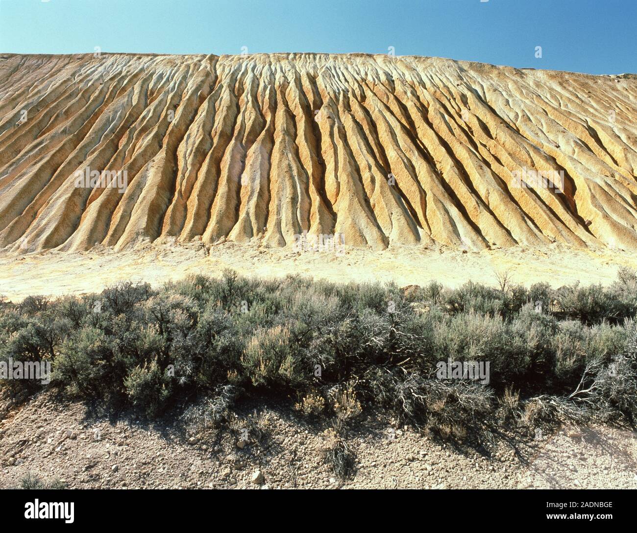 Opencast copper mine. Spill (upper frame) from an opencast copper mine ...