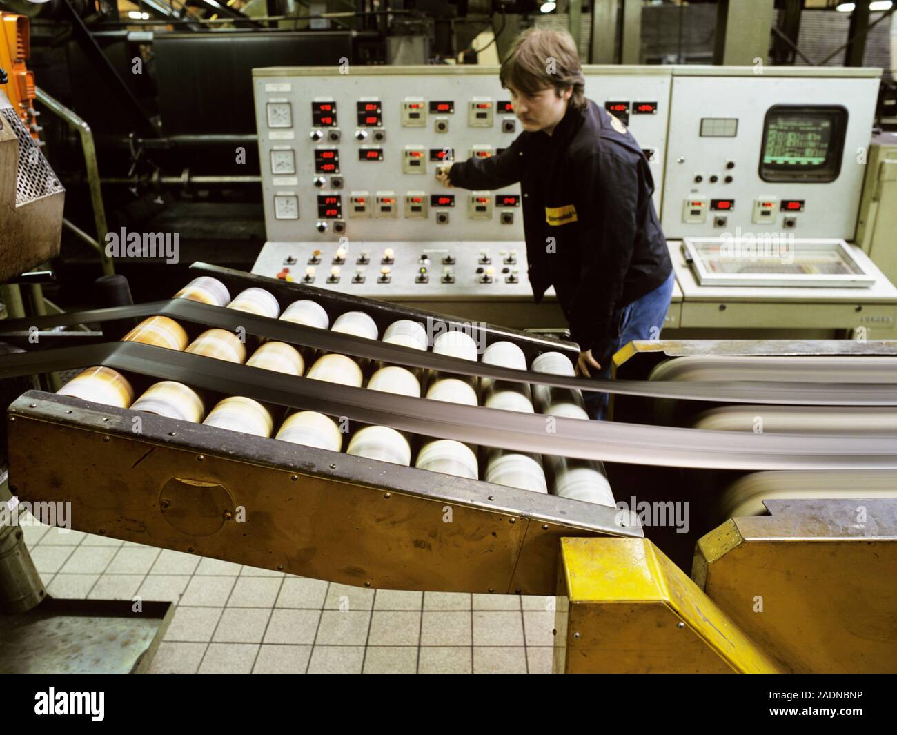 Production line in a factory that makes tyres from caoutchouc rubber ...