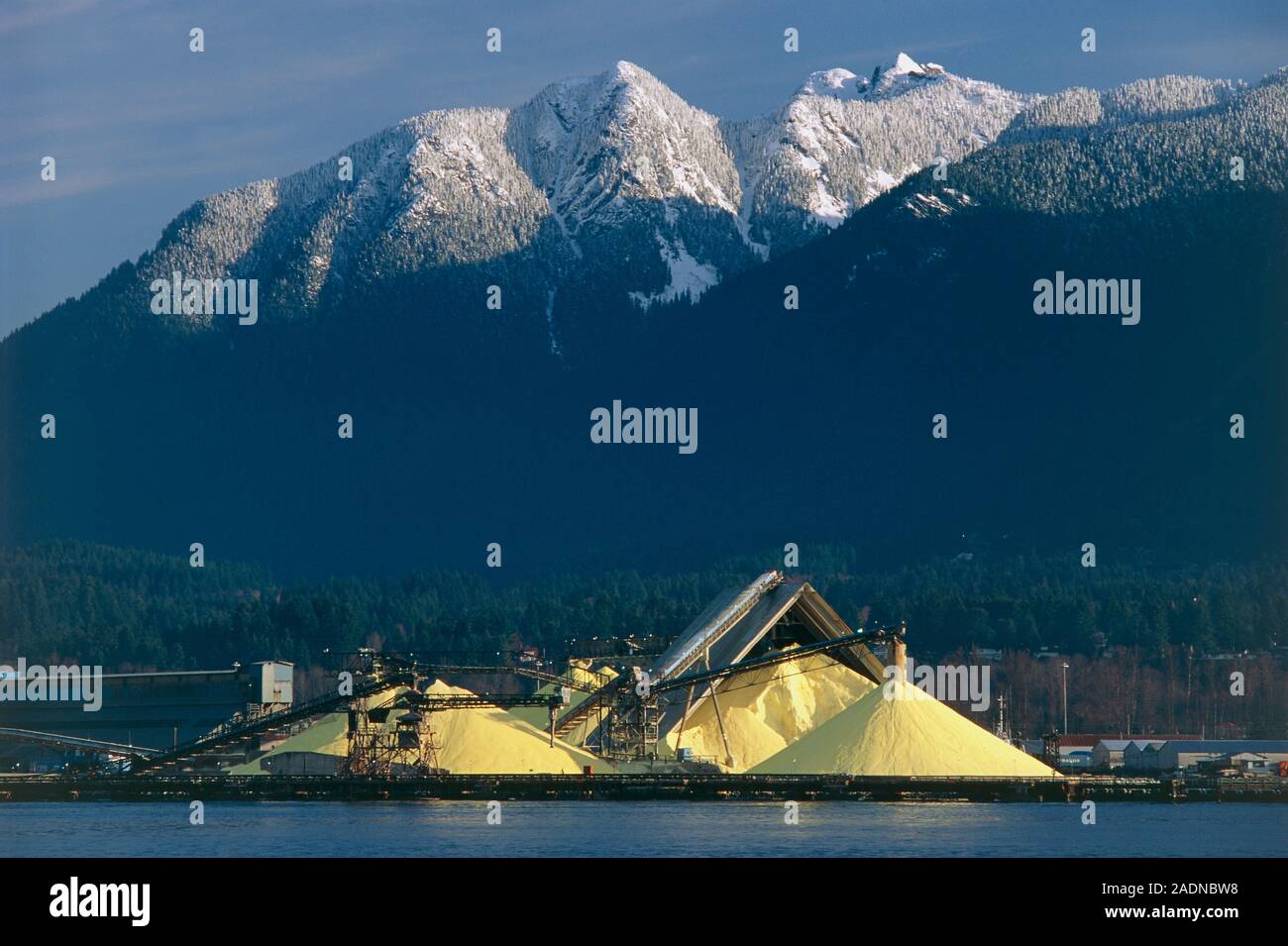 Piles of sulphur at a chemical plant. Sulphur may be obtained from ...
