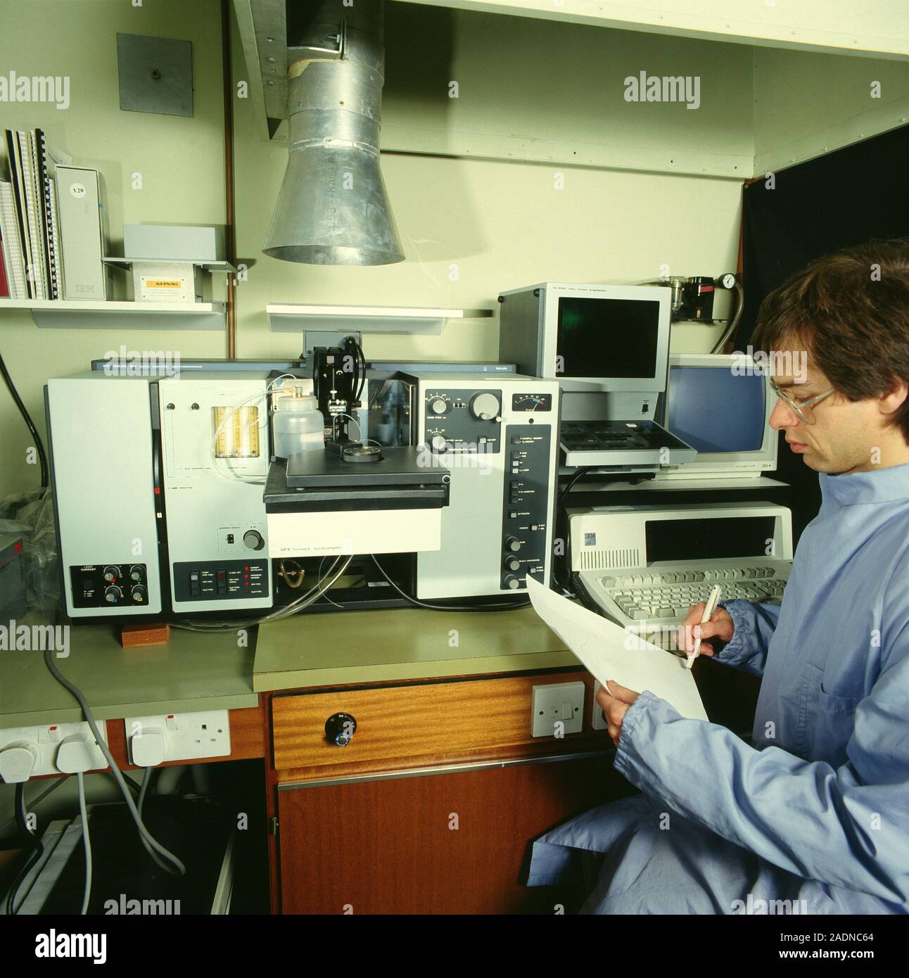 A researcher using an atomic absorption spectrometer at the British ...