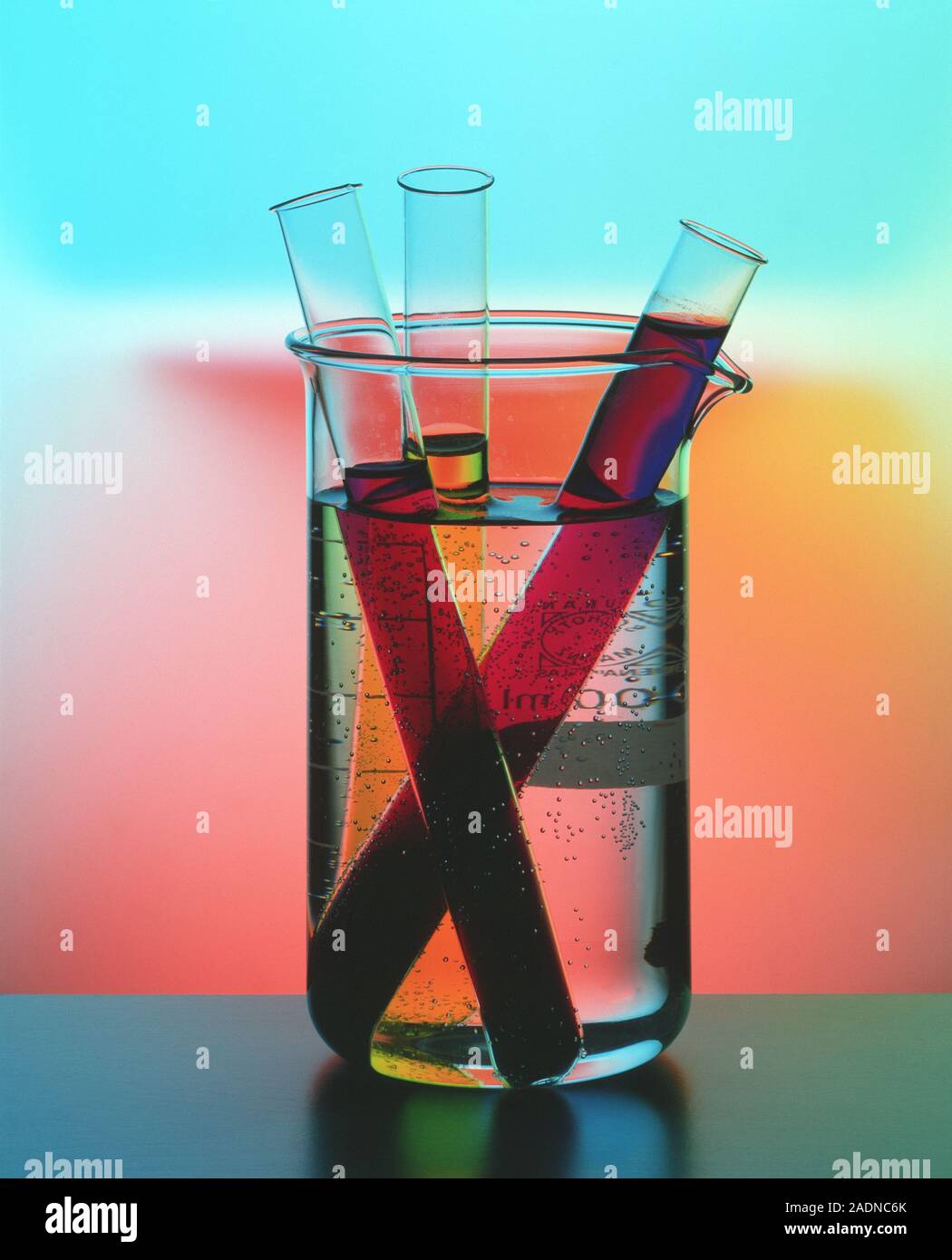 Laboratory equipment; test tubes in a beaker Stock Photo - Alamy