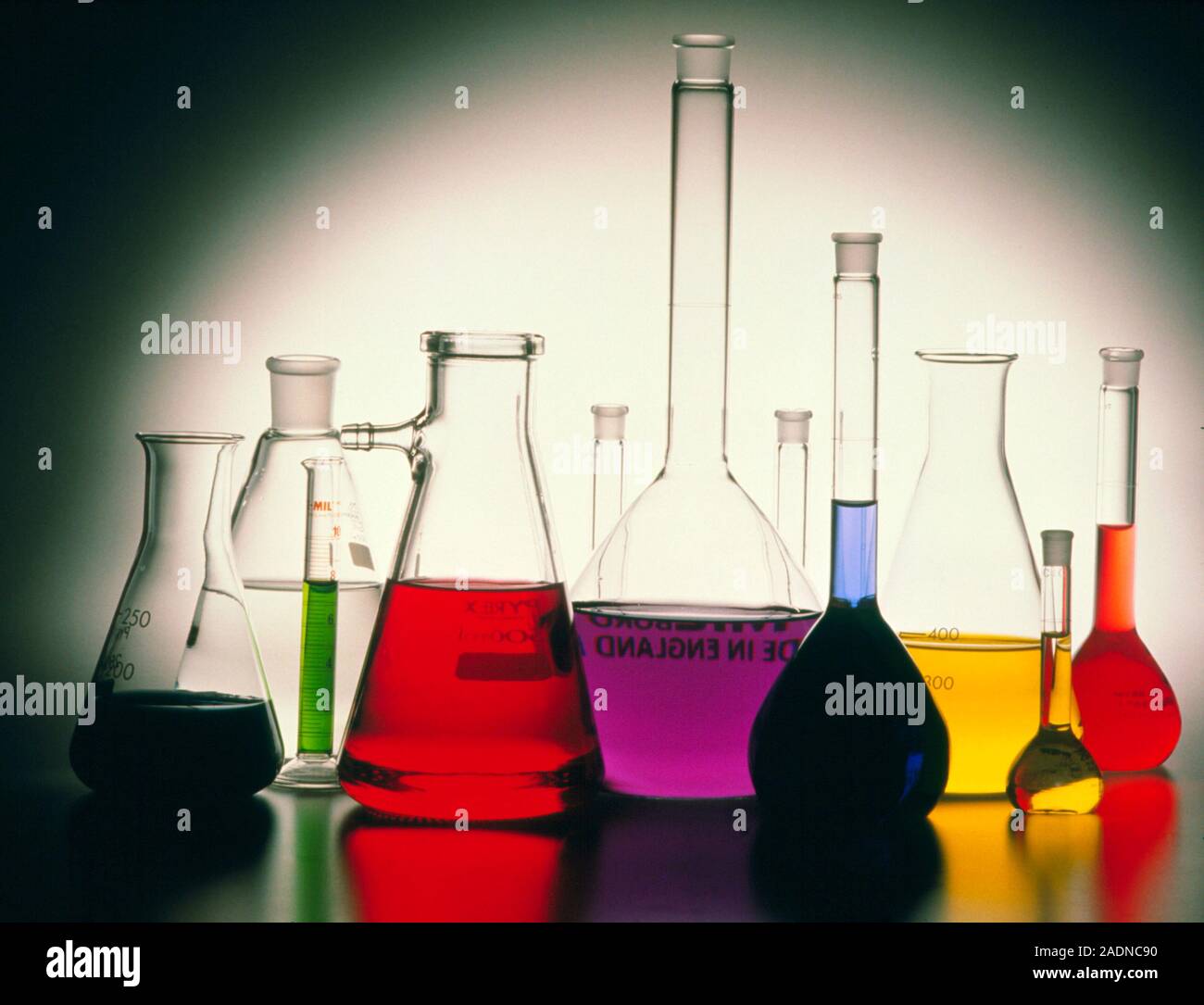 Chemical flasks. Assortment of laboratory flasks and a measuring ...