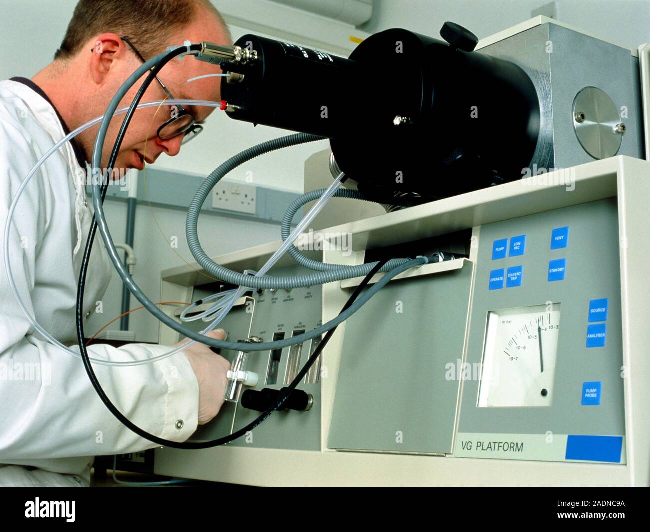 Mass Spectrometry. Technician using a mass spectrometer during the ...