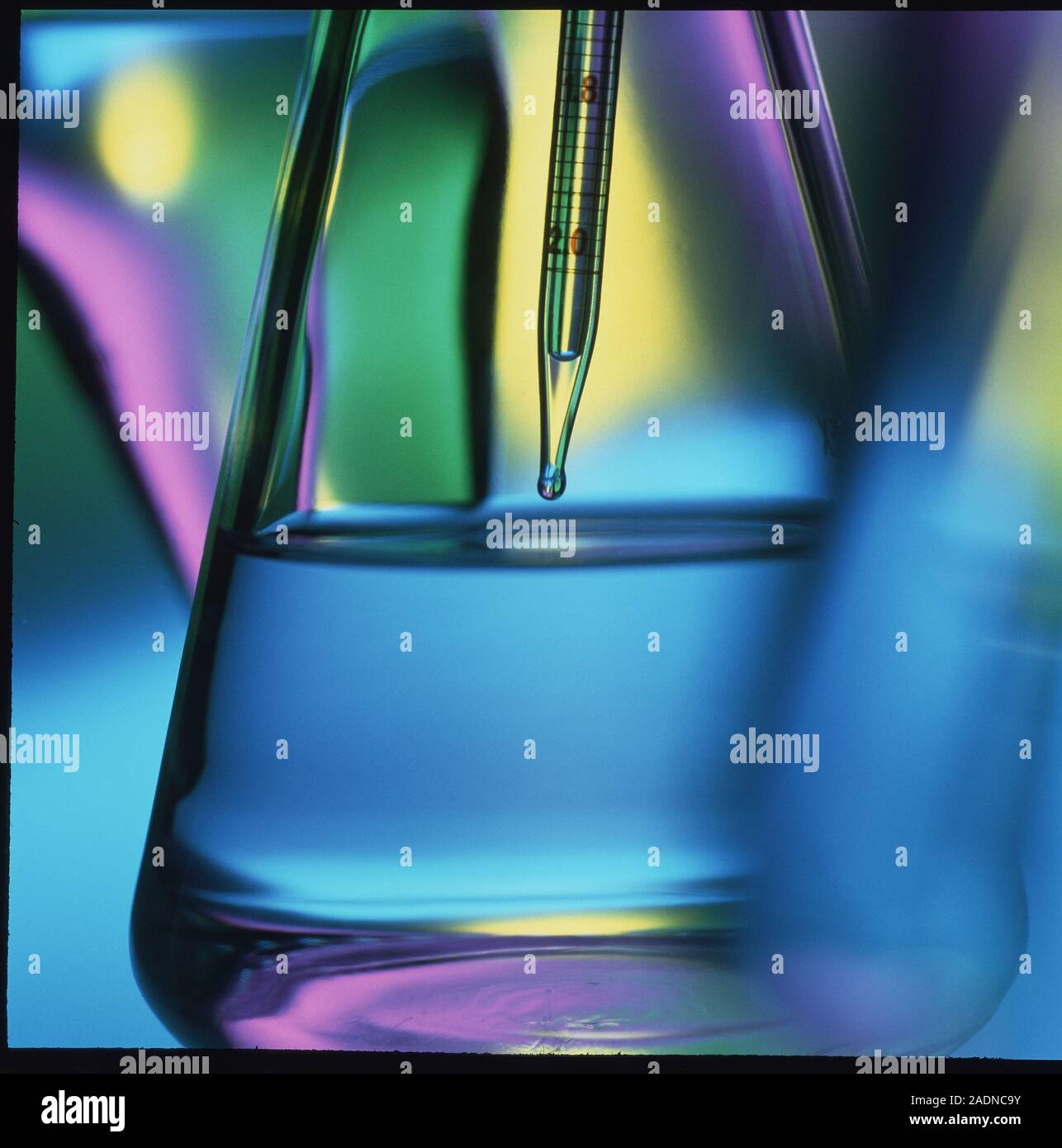 Conical flask & pipette. Abstract view of a pipette in a conical flask ...