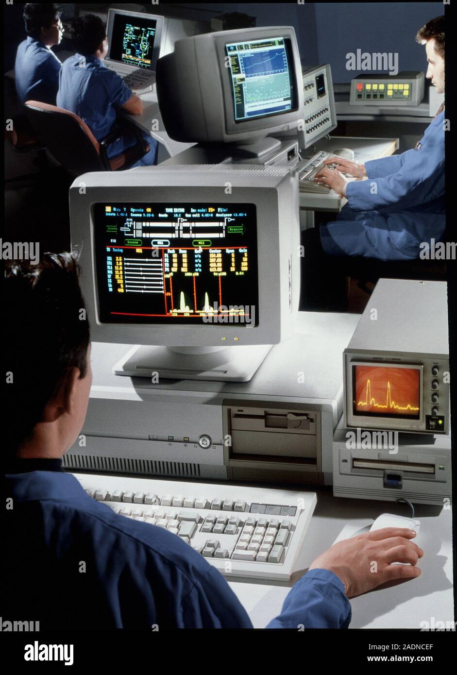 Mass spectrometry. Scientist analyses the data received from a mass ...