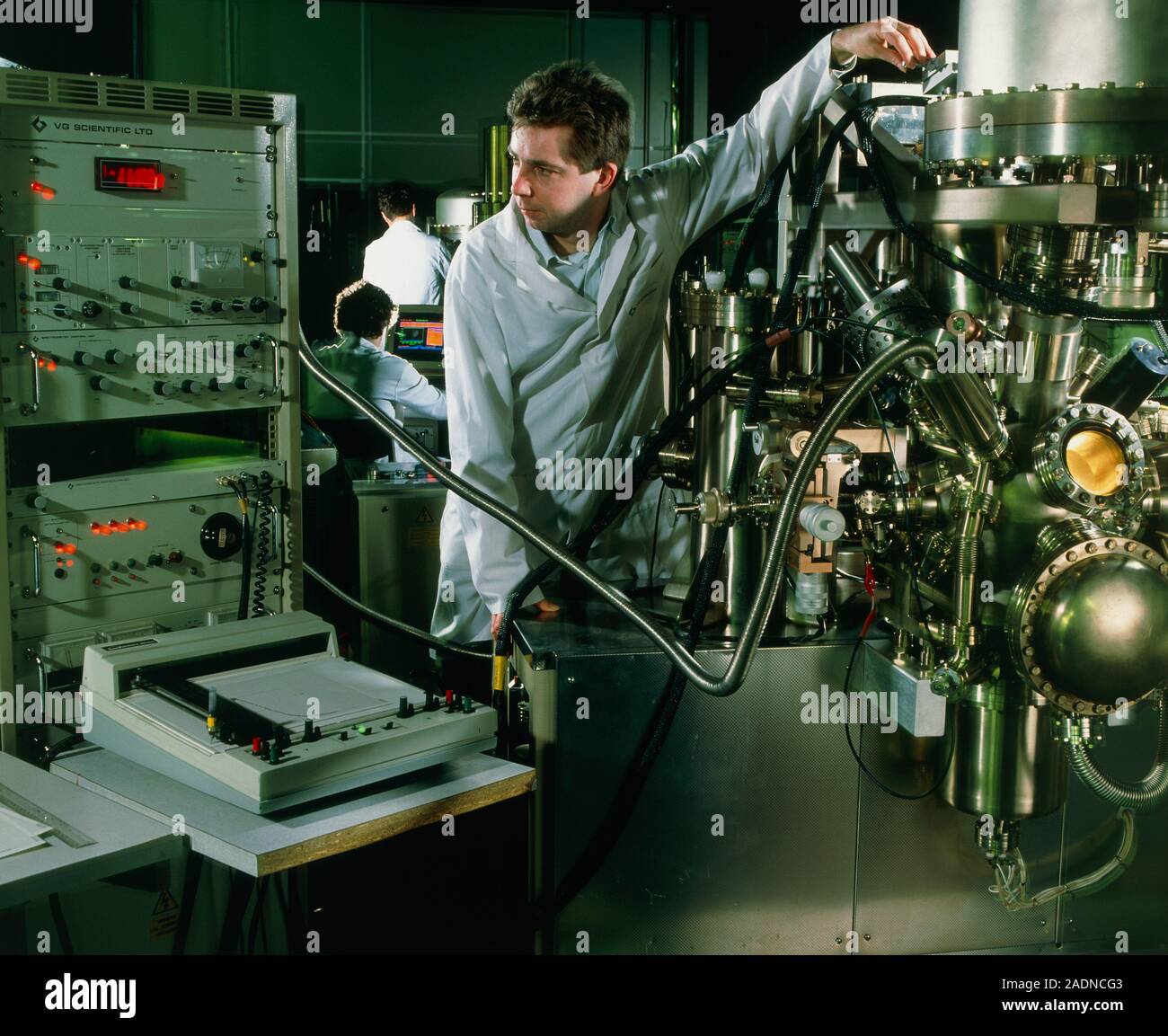 Spectrometer. View of a technician using a high resolution spectrometer ...