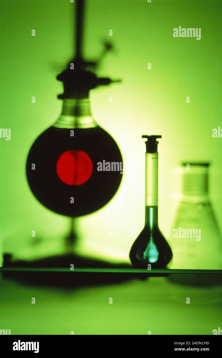 Laboratory flasks. Assorted items of laboratory glassware. At centre ...