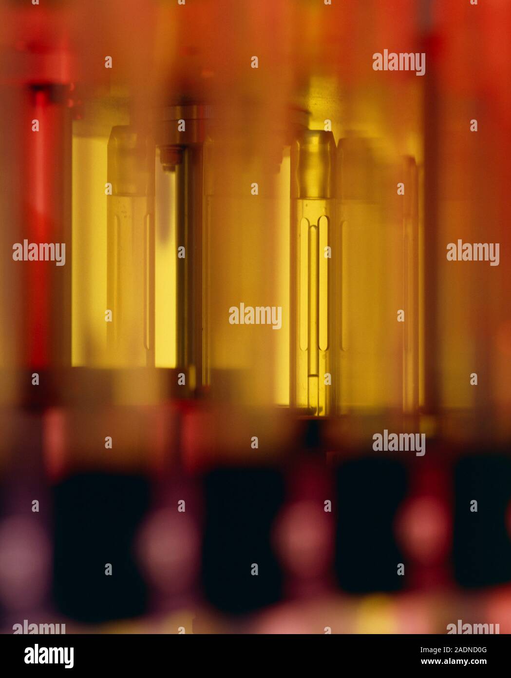 Test tubes in an NMR spectrometer. NMR (nuclear magnetic resonance ...