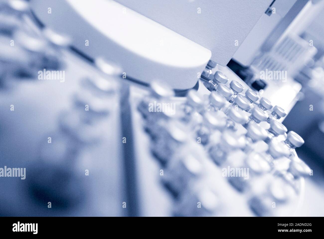 Sample vials on a carousel in a laboratory Stock Photo - Alamy