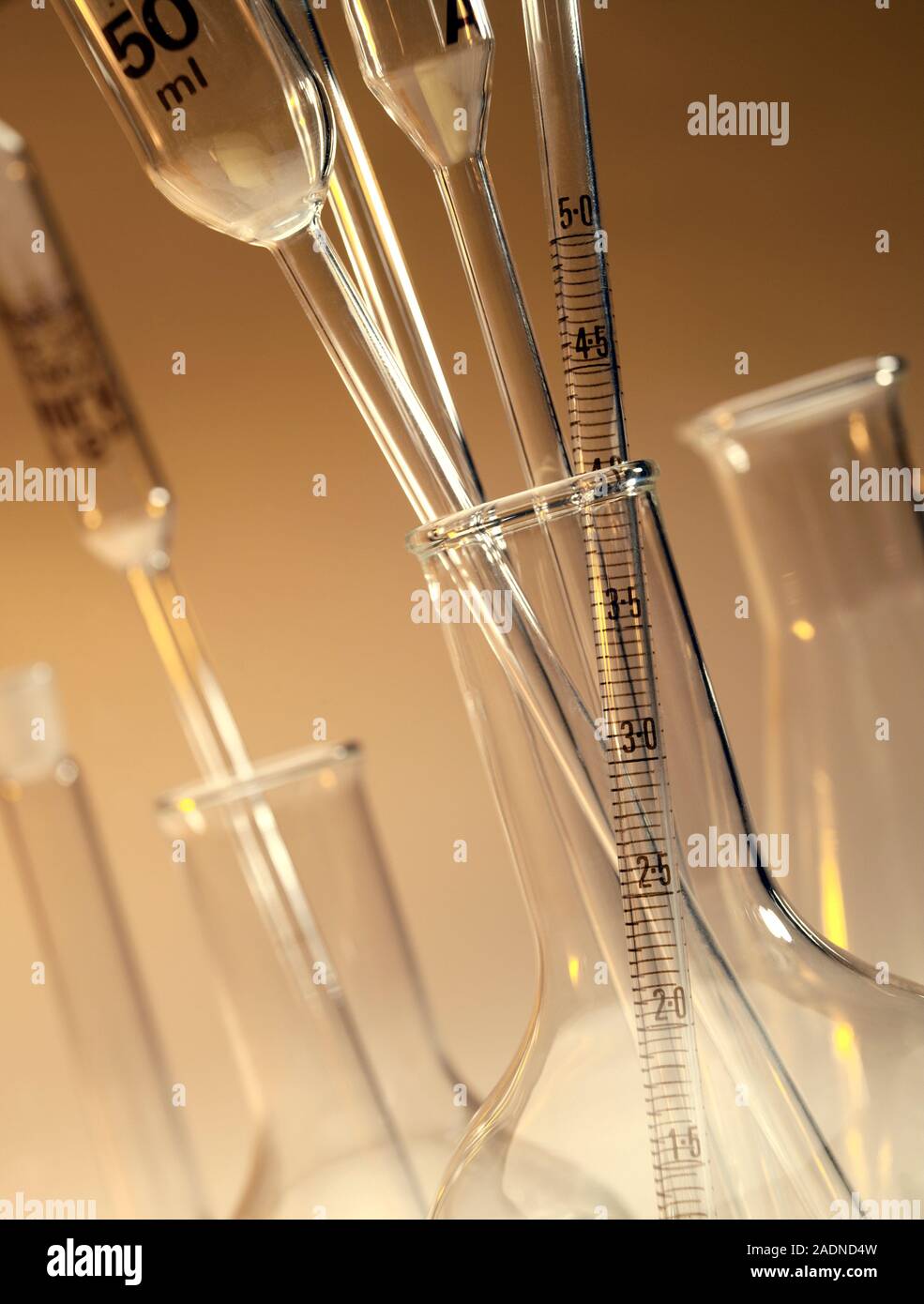 Laboratory glassware. Glass pipettes inside a flask Stock Photo - Alamy