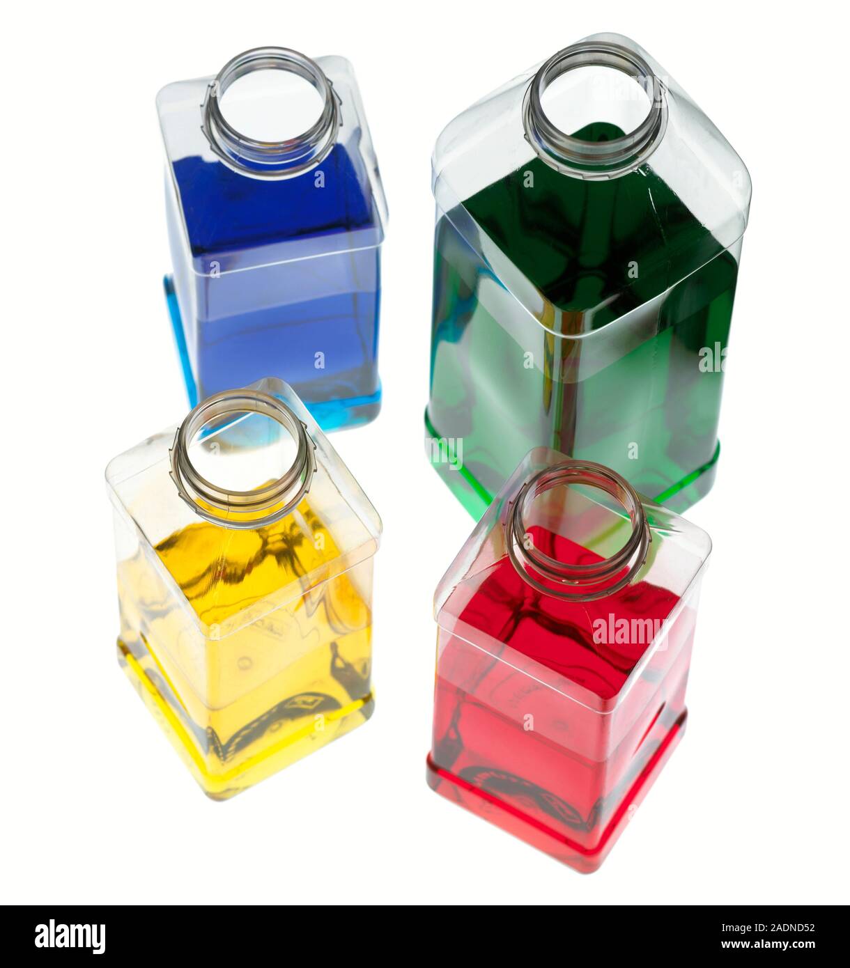 Coloured liquids in plastic laboratory containers Stock Photo - Alamy