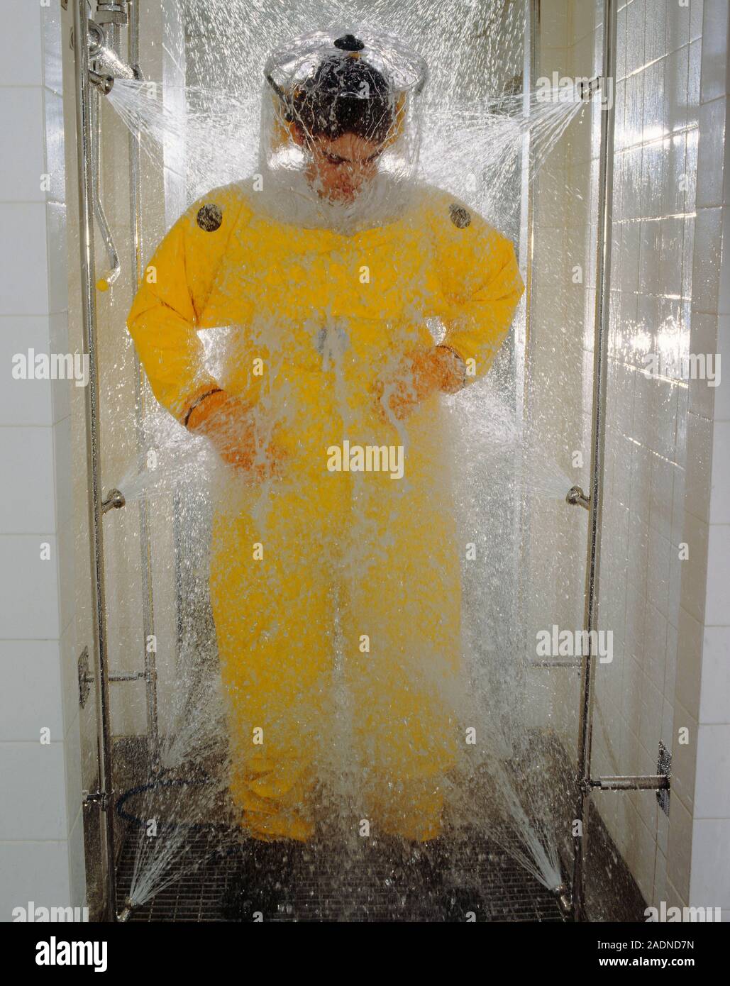 Precautionary shower for drug worker. An operator leaving a ...
