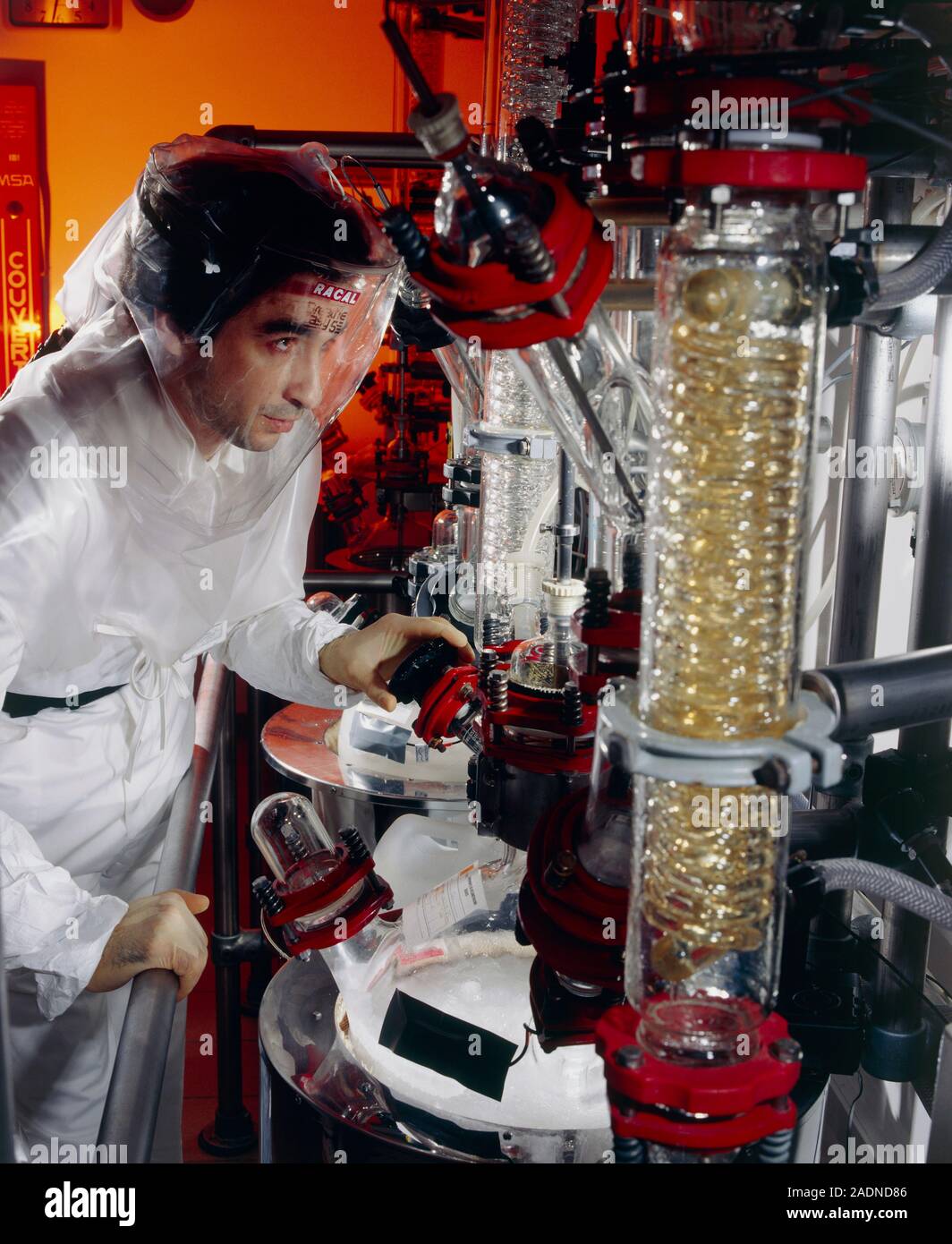 Aerosol production. A manufacturing operator monitors a stage in the ...
