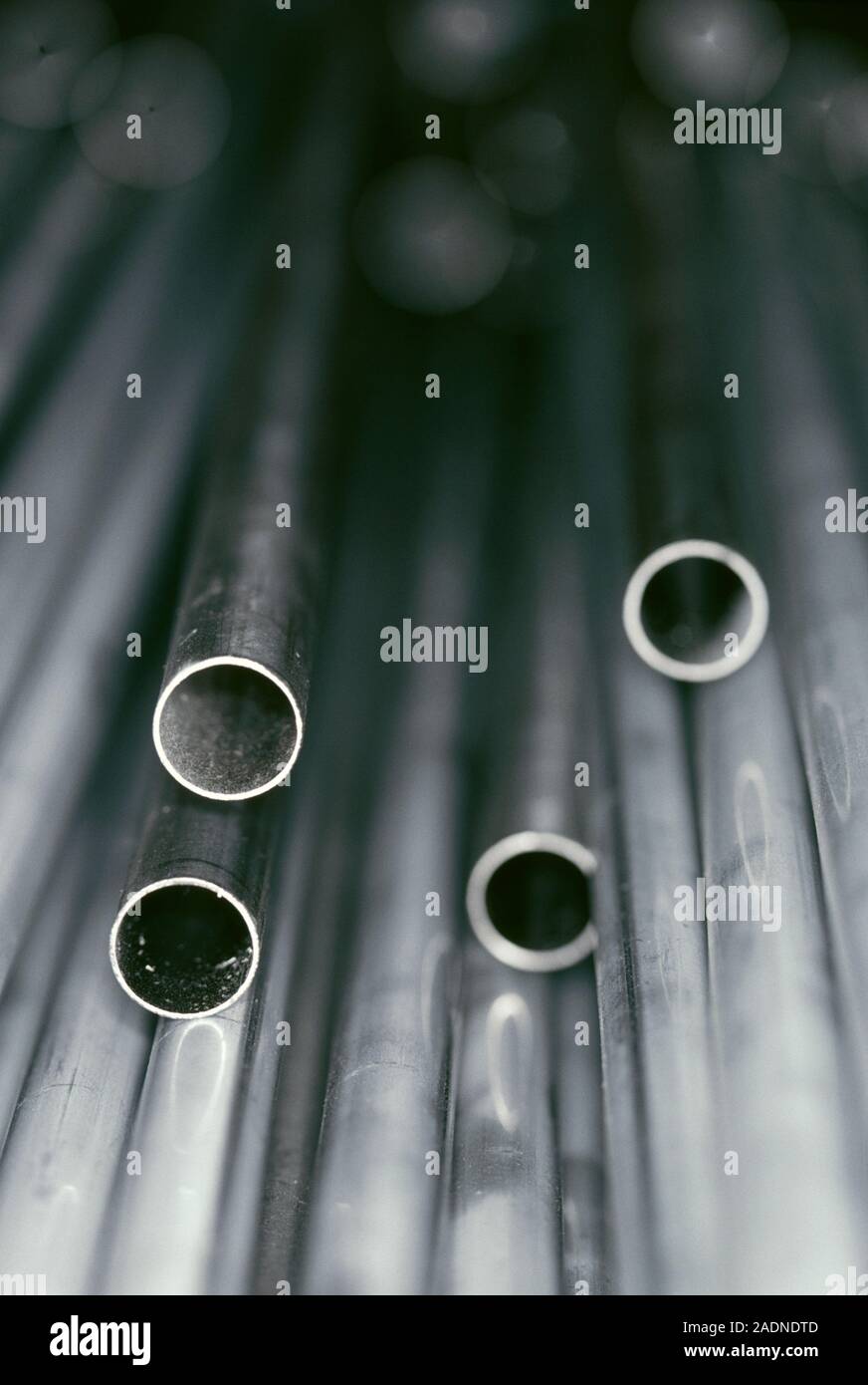 Metal pipes. Extruded steel piping Stock Photo - Alamy