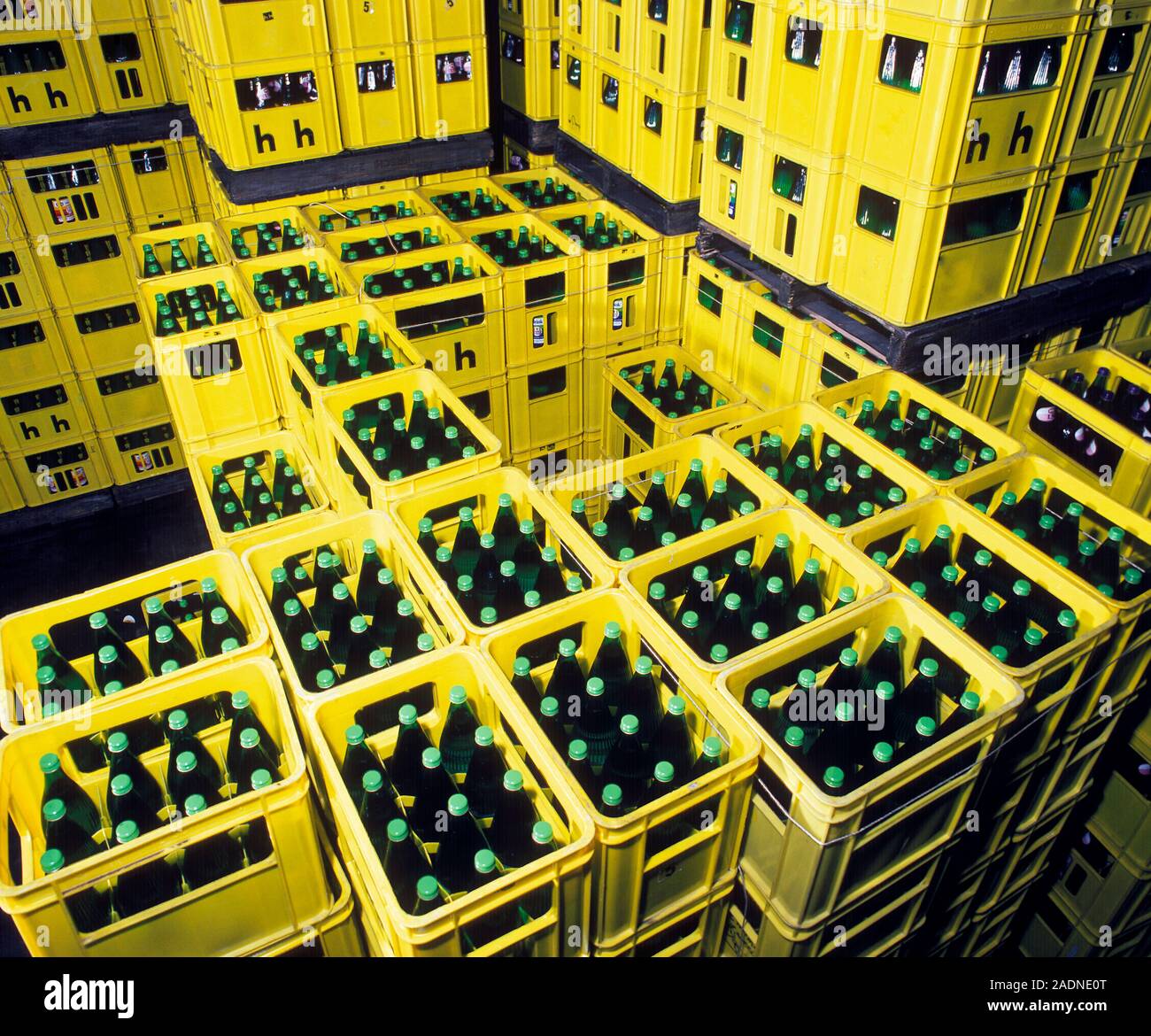 Soft drink distribution. Bottles of lemonade in crates at a factory ...
