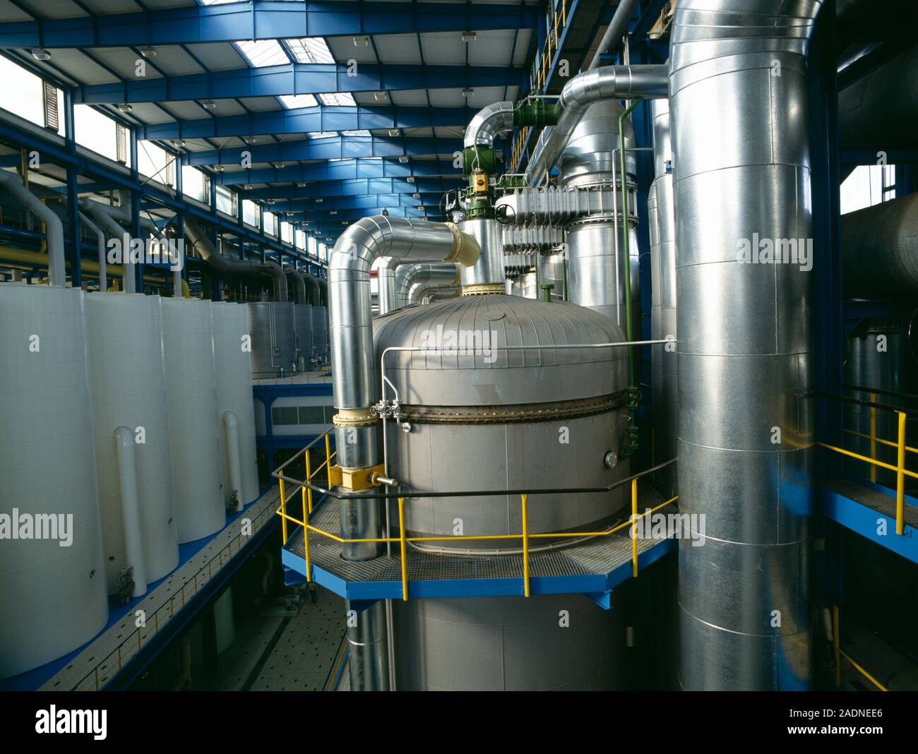 Sugar factory. Boiling machines used to boil sugar cane juice down to a ...
