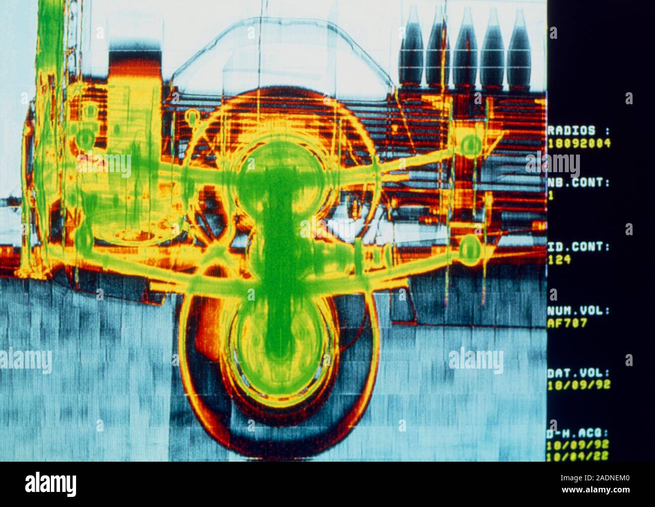 Customs lorry X-ray. Monitor view of a coloured X- ray of the cabin of ...