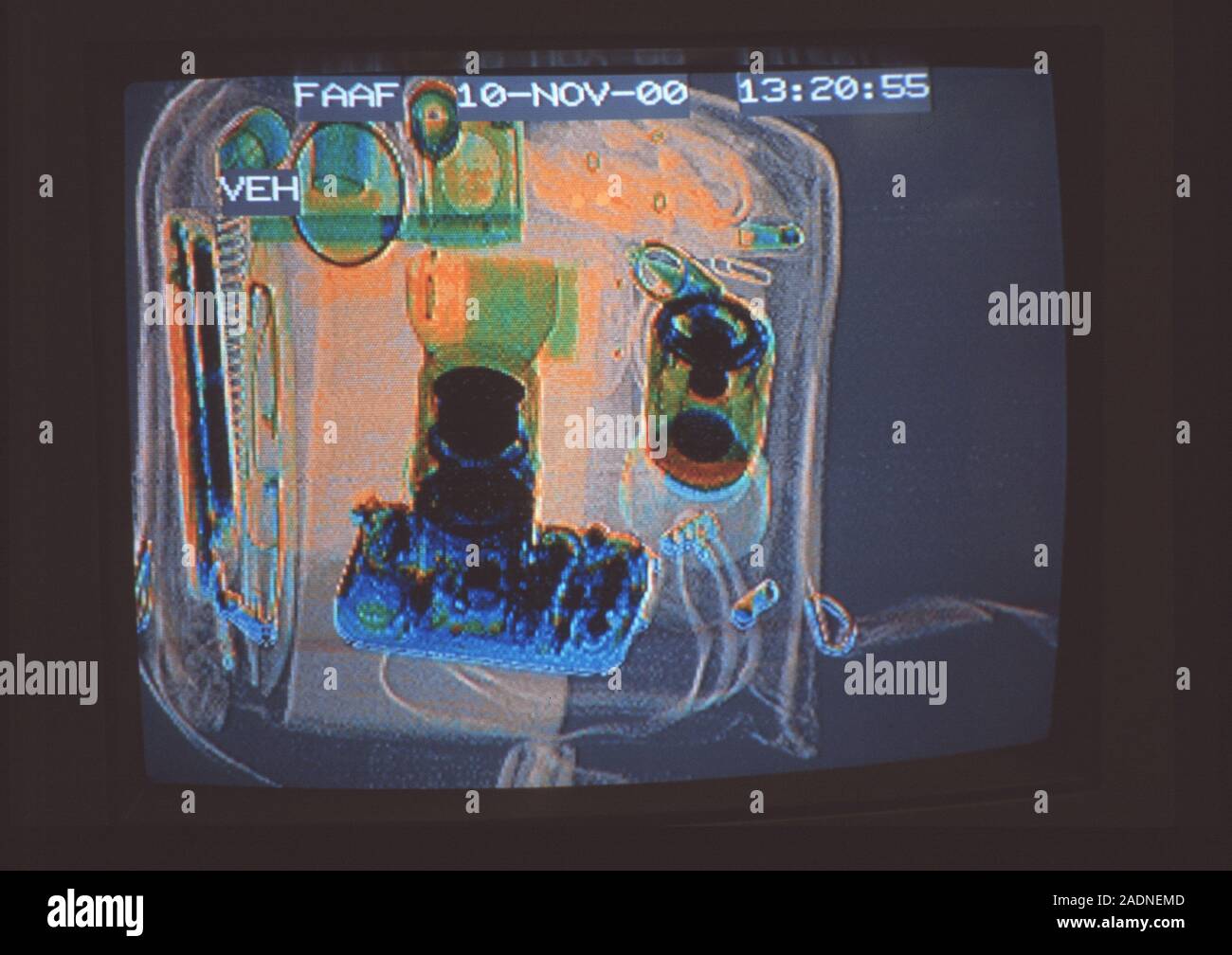 Bag X-ray. Coloured X-ray showing the contents of a suitcase as ...