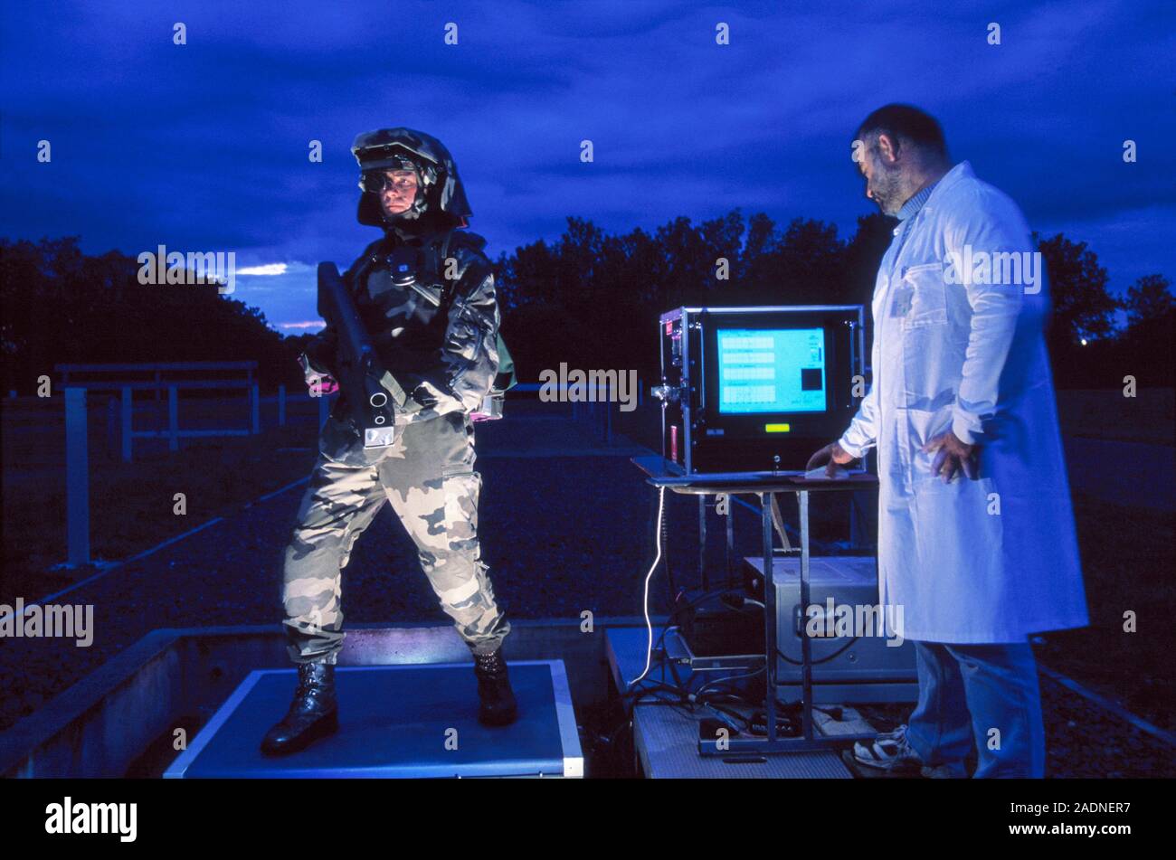 Testing military equipment. Military scientist uses a weight-sensing ...