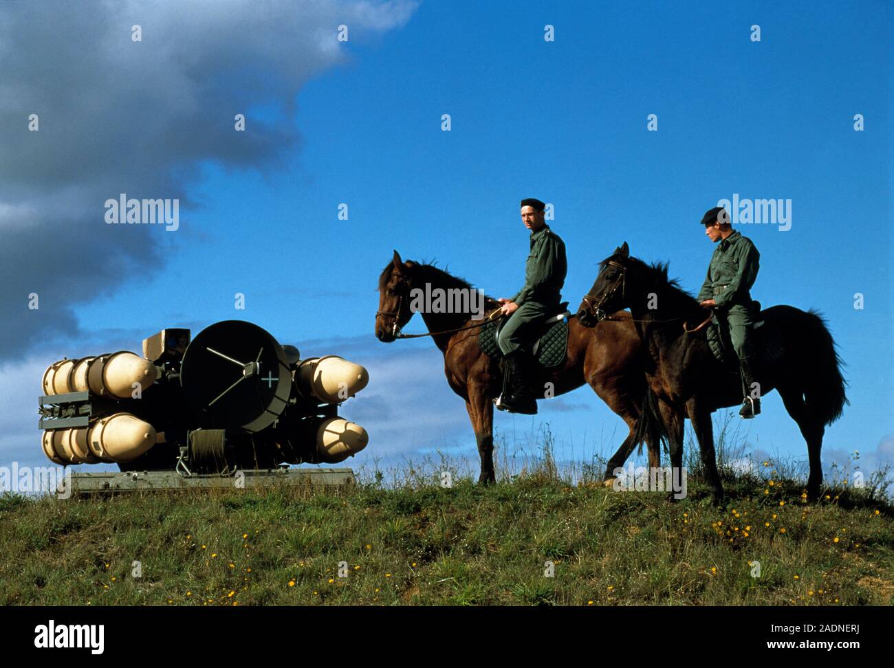 Nuclear missile base security. Military personnel on horseback patrol a ...