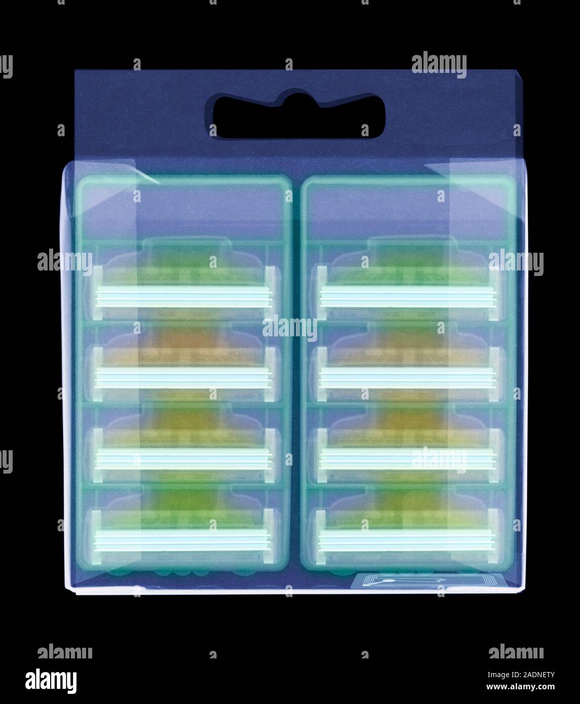 Security tag (lower right) on the base of a packet of ten razor blades ...