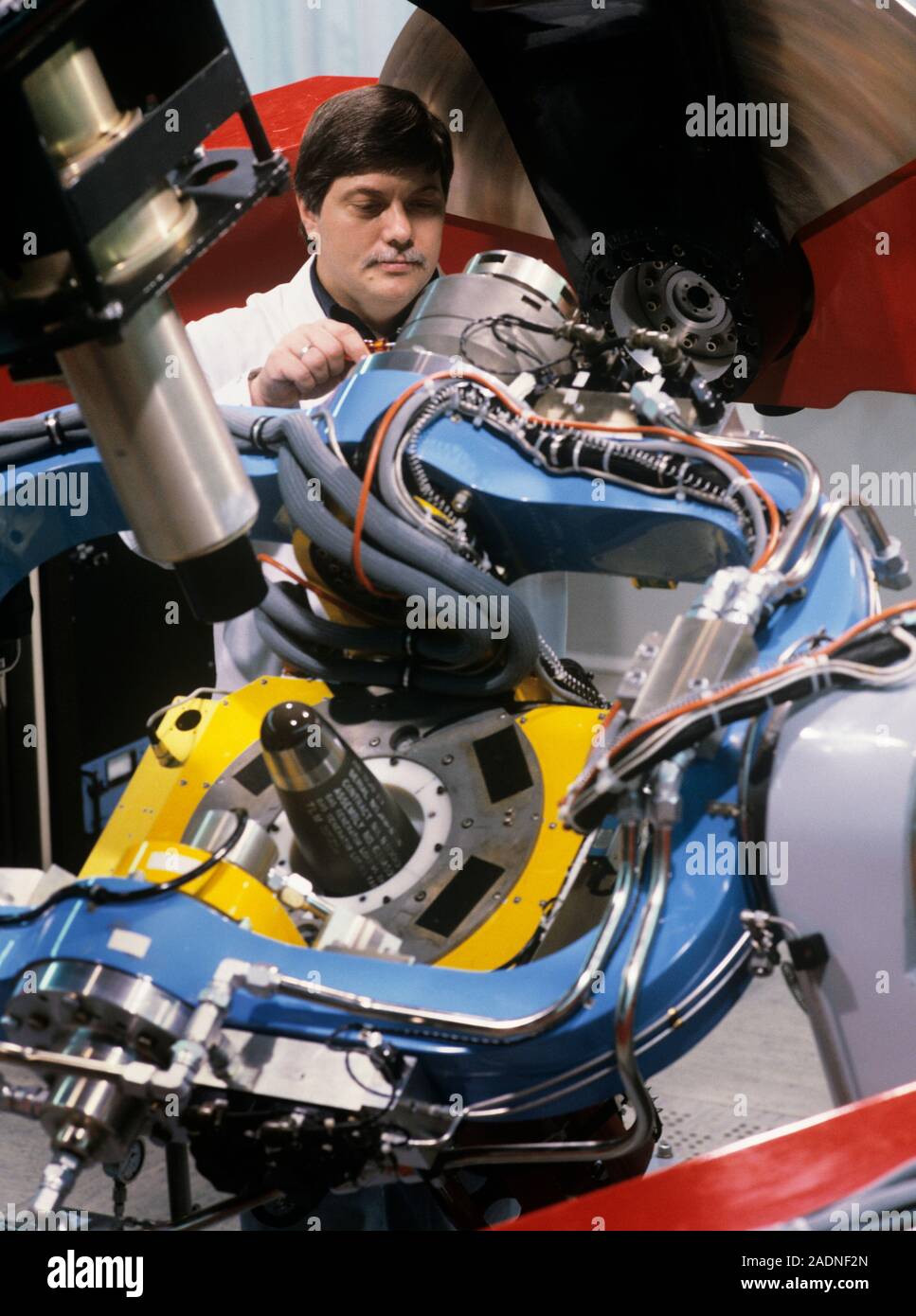 MODEL RELEASED. Missile simulator. Technician working on a missile ...